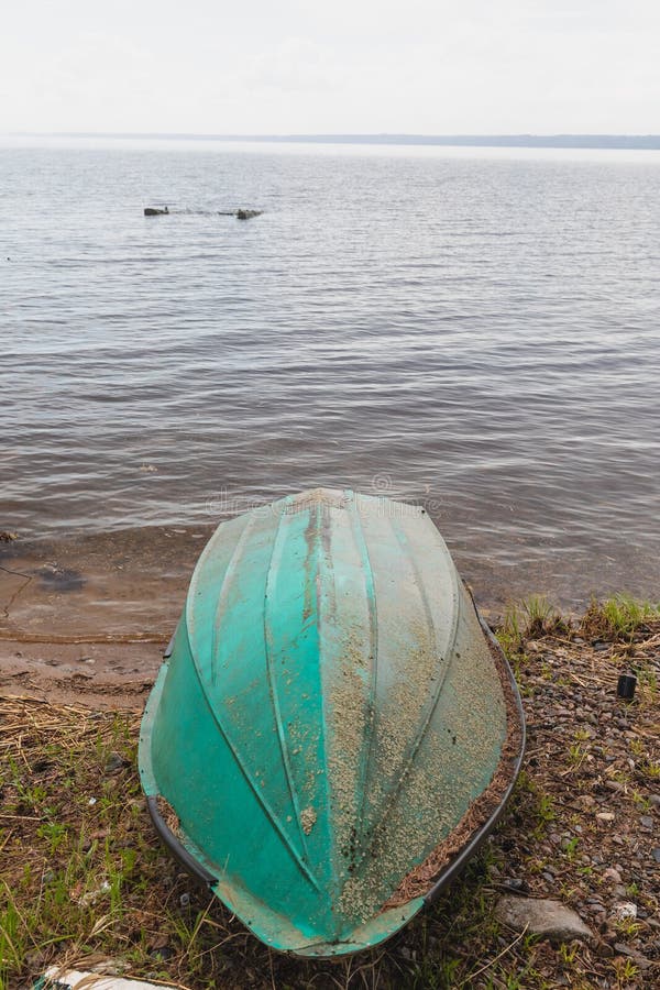 Inverted Boat on Deserted Beach Stock Image - Image of sandy, inverted ...
