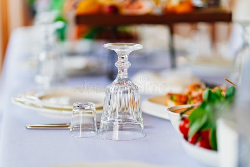 Inverted Glasses on the Table. Table Setting for an Outdoor Holiday ...