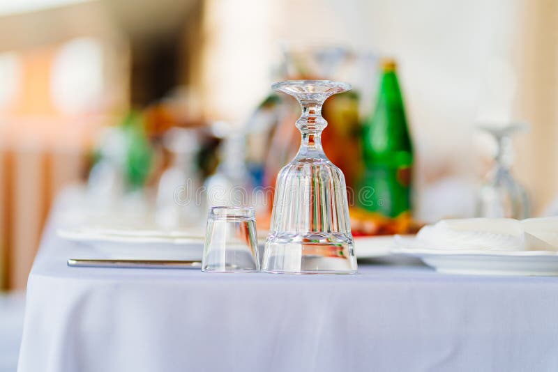 Inverted Glasses on the Table. Table Setting for an Outdoor Holiday ...
