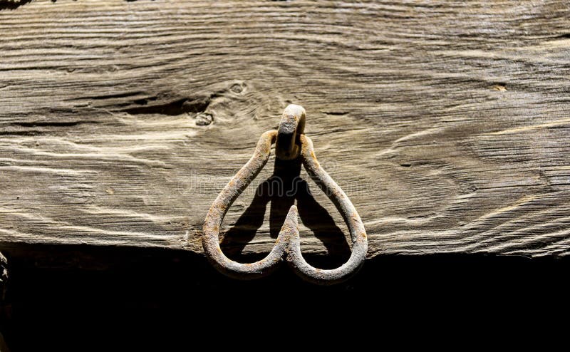 Inverted Heart-shaped Shackle Stock Photo - Image of antique, detention ...