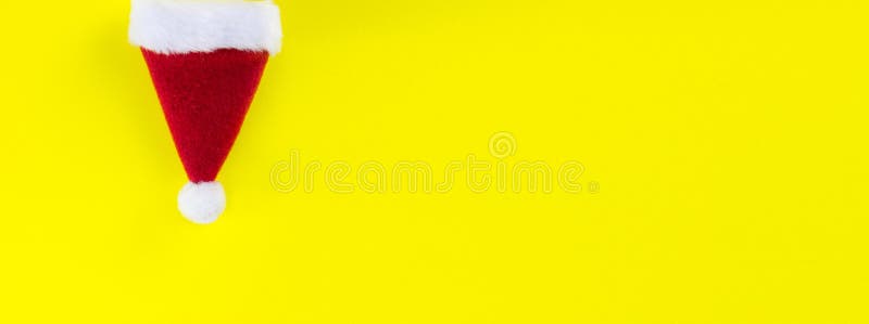 Inverted Santa S Red Hat on Yellow Background Stock Image - Image of ...