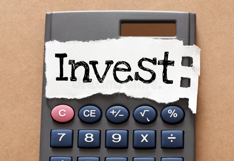 INVEST on a Small Piece of Paper Lying on the Keyboard Stock Image ...