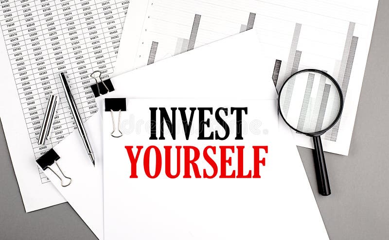 INVEST in YOURSELF Text on Paper on Chart Background Stock Image ...