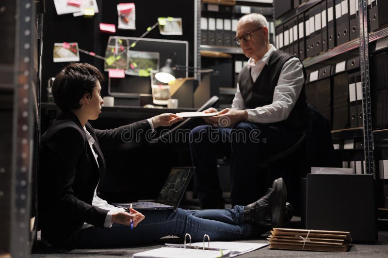 Investigators Working Overhours at Criminal Investigations Stock Photo ...