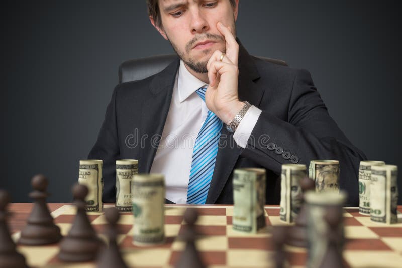 Investment Strategy Concept. Man is Playing Chess with Money Stock ...
