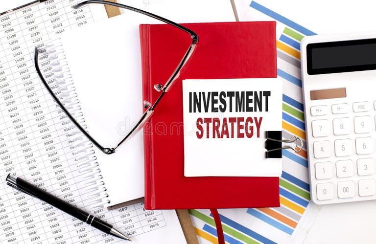 INVESTMENT STRATEGY Text on Notebook with Chart, Calculator and Pen ...