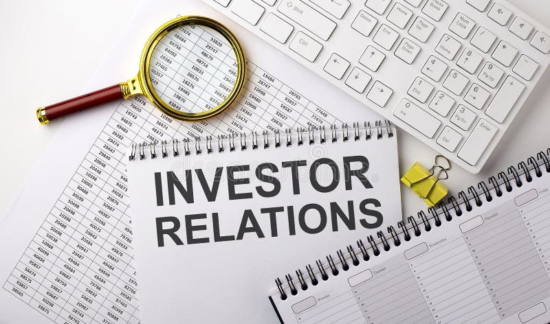 INVESTOR RELATIONS Text Written on a Notebook on Chart with Keyboard ...