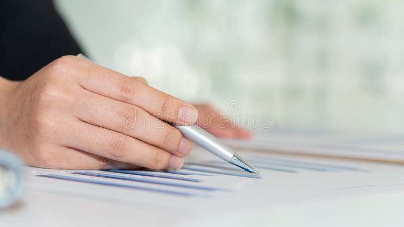 Investors Analyze Financial Reports and Key Performance Indicators. of ... Investors Analyze Financial Reports and Key Performance Indicators. of ...