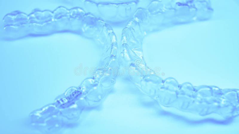 Invisible Dental Teeth Brackets Tooth Aligners on Blue Background ...