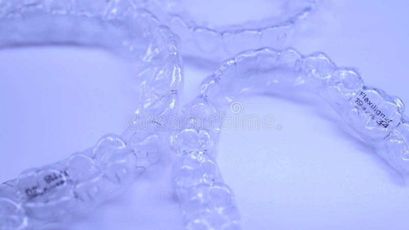 Invisible Dental Teeth Brackets Tooth Aligners on Blue Background ...