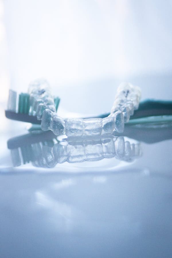 Invisible bracket aligners stock photo. Image of invisalign - 221005040