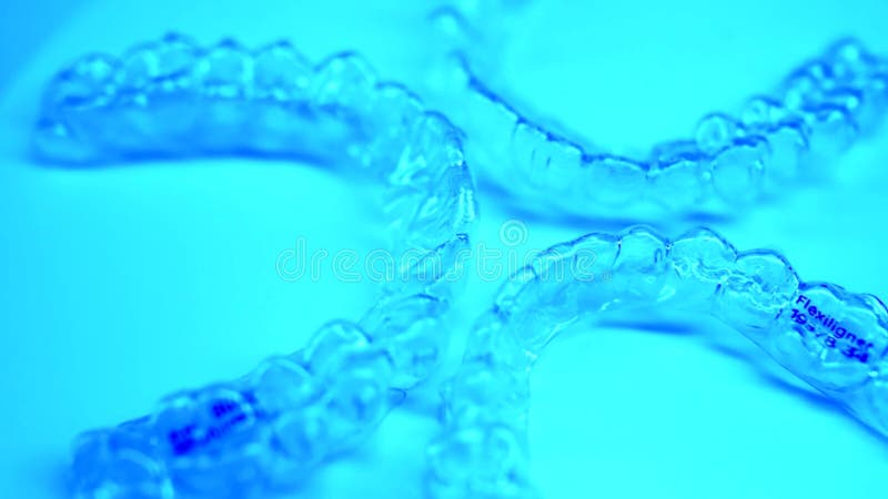 Invisible Dental Braces Teeth Aligners with Light Effects. Plastic ...