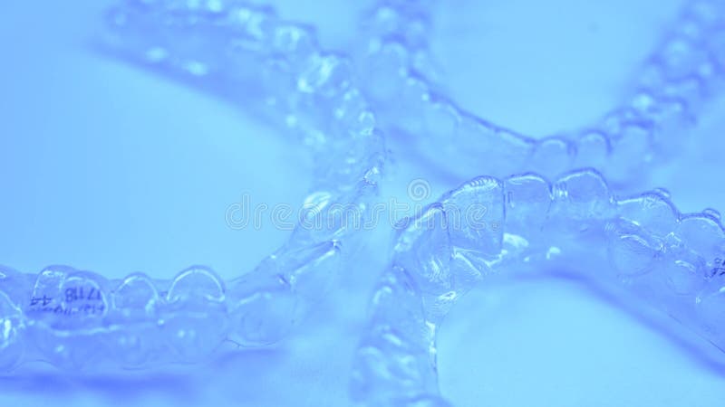 Invisible Dental Braces Teeth Aligners with Light Effects. Plastic ...