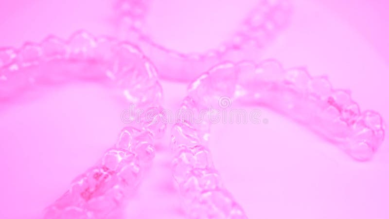 Invisible Dental Braces Teeth Aligners Pink Background. Plastic Braces ...