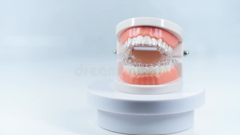 Invisible Dental Teeth Brackets Teeth Aligners on Blue Background ...