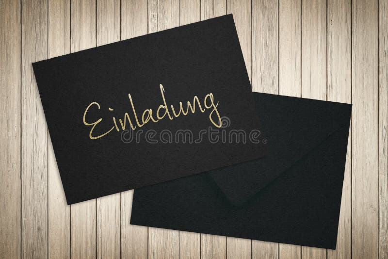 INVITATION in German Handwritten on a Black Envelope and Card Lying on ...