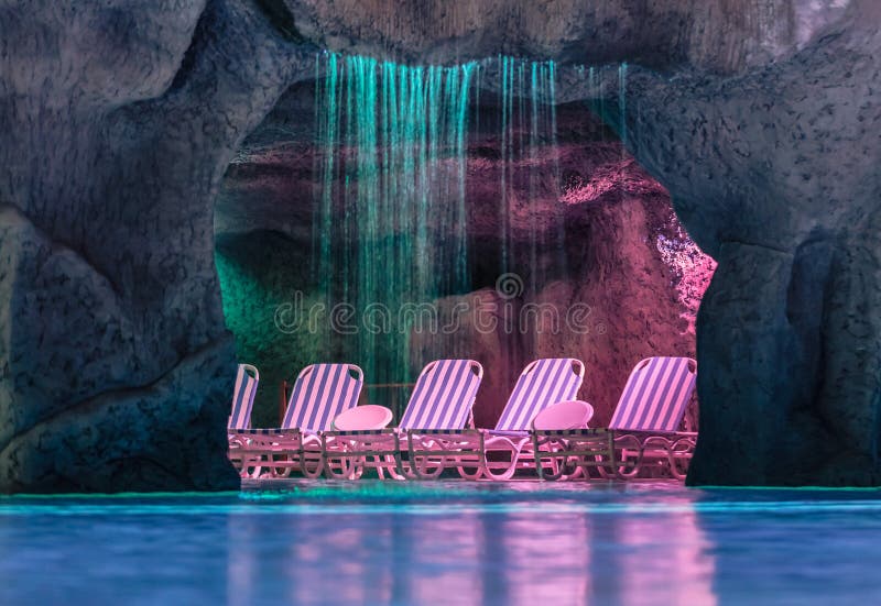 Inviting Cozy Comfortable Grotto in Swimming Pool at Night Time Stock ...