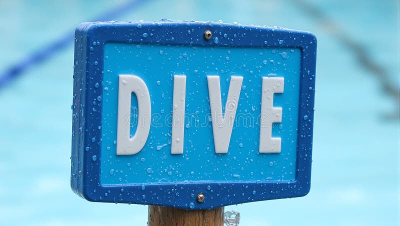 Inviting Dive Sign by the Pool with Water Droplets Blue Backdrop Stock ...