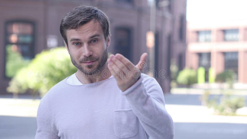 Inviting Gesture by Young Man in Suit Stock Image - Image of customer ...