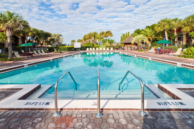 Inviting pool stock photo. Image of fence, swimming, tropical - 76404454