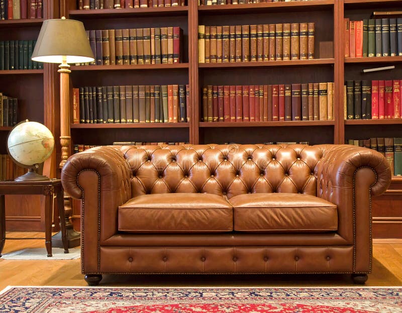 Inviting Scene of a Classic Leather Sofa in a Cozy Library Setting ...