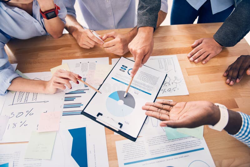 Involved Colleagues Discussing Project Stock Photo - Image of daytime ...