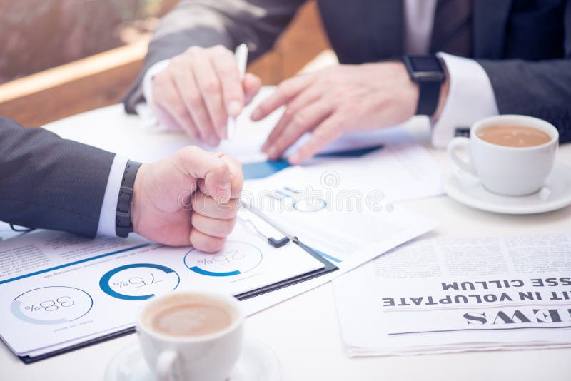 Involved Colleagues Sitting at the Table Stock Image - Image of busy ...