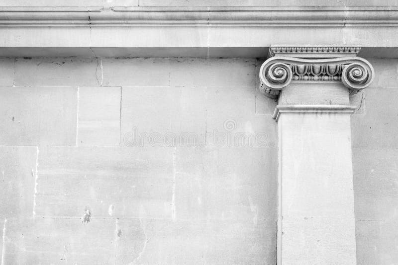 White False Column Capital Over Stone Wall Stock Photo - Image of stone ...