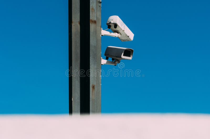 CCTV Camera with Canary Wharf, London, England, UK in the Background ...