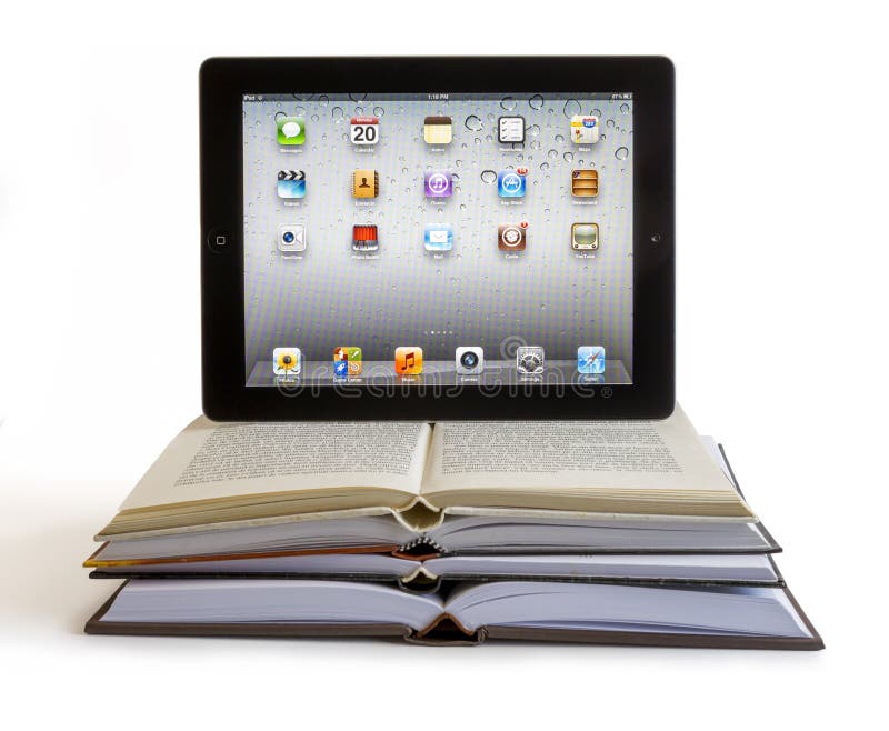 Ipad 3 on books editorial photography. Image of apple - 26838067