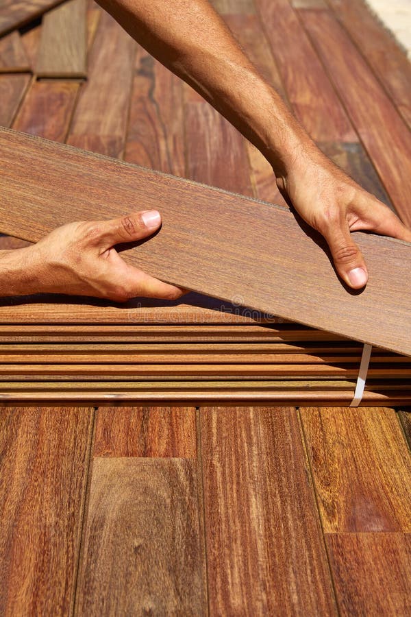 Ipe Deck Installation Carpenter Hands Holding Wood Stock Photo - Image ...