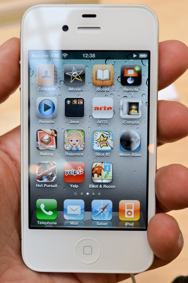 Iphone 4s in hand editorial stock photo. Image of calendar - 28378798
