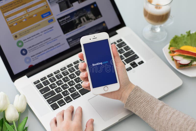 IPhone with App Booking.com Online Hotel Reservations on Screen ...