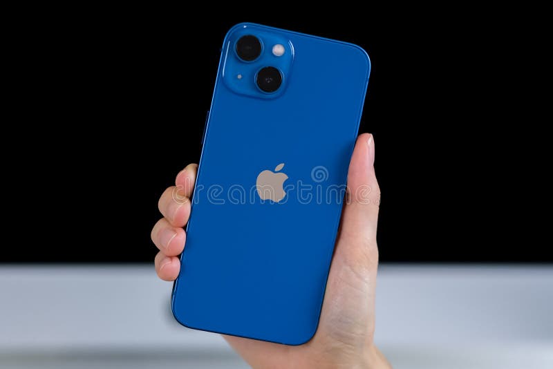 IPhone 13 in blue editorial image. Image of technology - 230634345