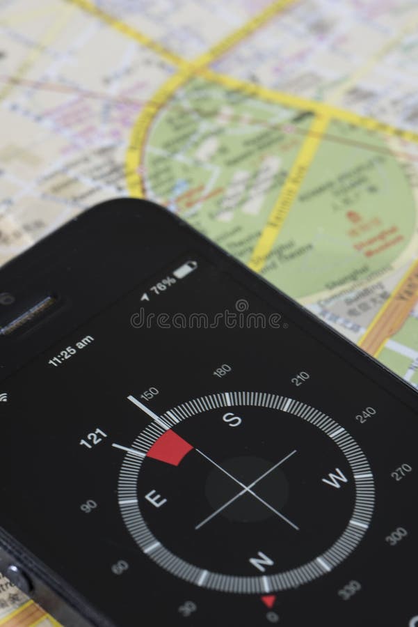 IPhone compass on a map stock photo. Image of smart, smartphone - 55122320