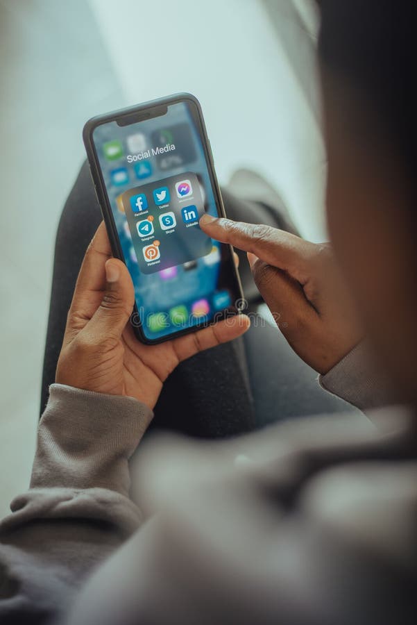 An Iphone with Multiple Different Types of App Icons is Shown in the ... An Iphone with Multiple Different Types of App Icons is Shown in the ...