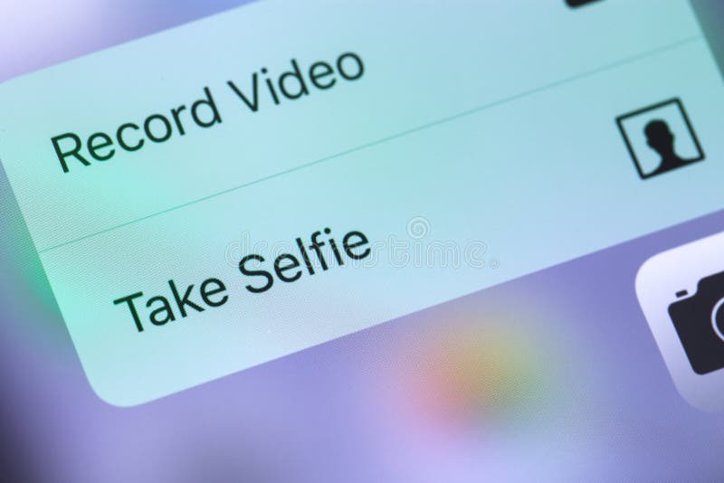 IPhone Displaying the Camera Icon App and Context Menu Buttons ...