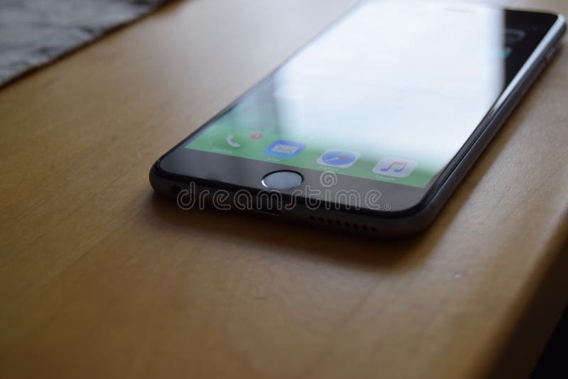 IPhone 6 Plus on a Sleek Wooden Table Editorial Stock Photo - Image of ...