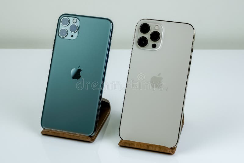 IPhone 12 Pro Max Gold Next To Iphone 11 Pro Max in Green. Editorial ...