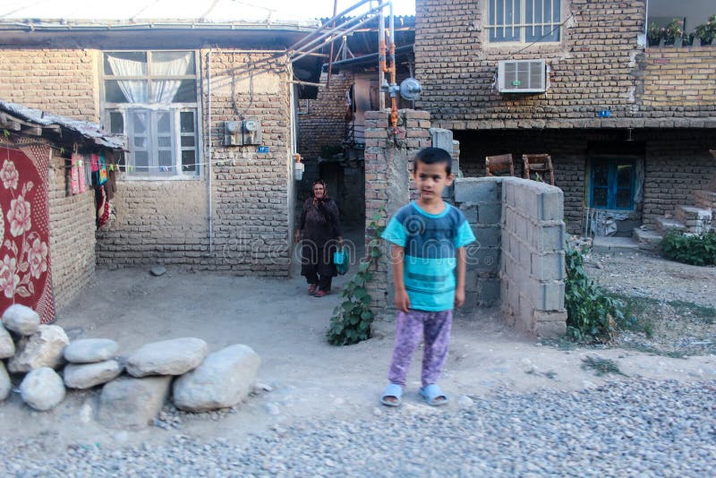 IranMazandaran, Iran - 19 July 2017: Iranian Kid in a Rural Area with ...