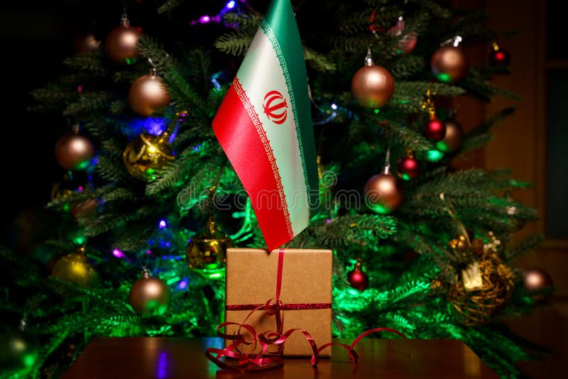Iran Flag and Gift Box on the Background of the Christmas Tree Stock ...