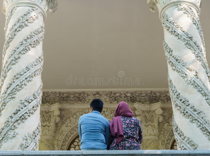 Iranian Couple Standing Near The Persian Palace In Tehran Iran 22 June