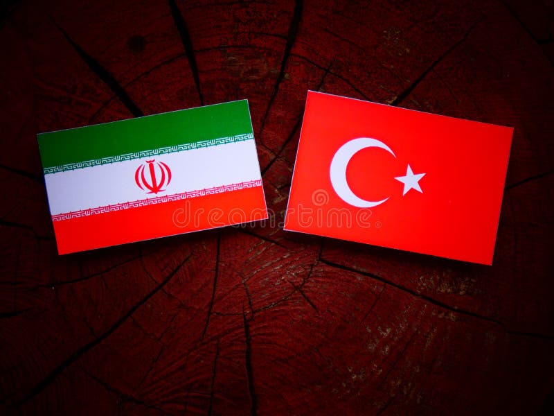 Iranian Flag with Turkish Flag on a Tree Stump Stock Photo - Image of ...