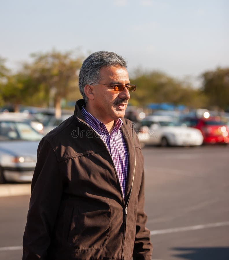 Iranian man stock image. Image of relaxed, green, casual - 10287587