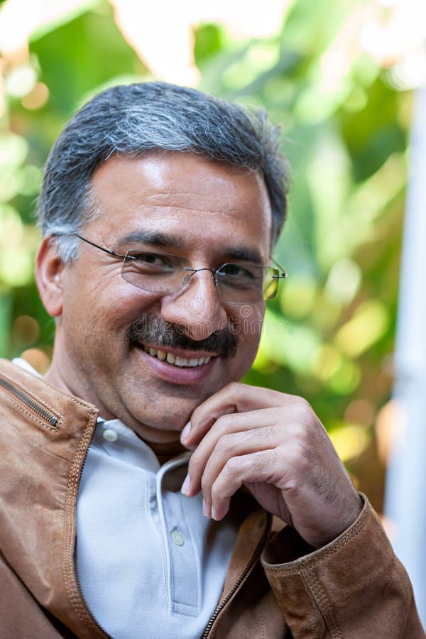 Iranian Man Writing a Note on the Knee Stock Photo - Image of pepper ...