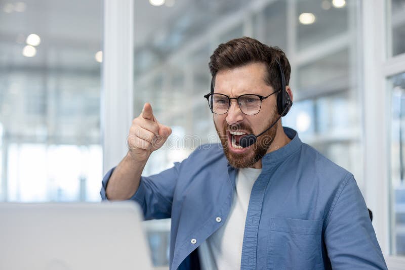 An Irate Customer Service Representative Yells while Pointing His ...