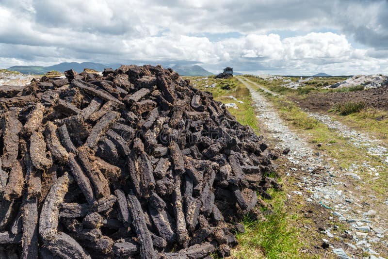 Ireland Turf stack stock photo. Image of plant, countryside - 193618418