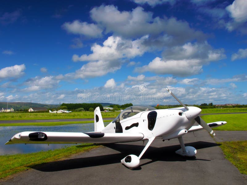 Irish Plane Parked on Runway Stock Image - Image of green, runway: 26402067