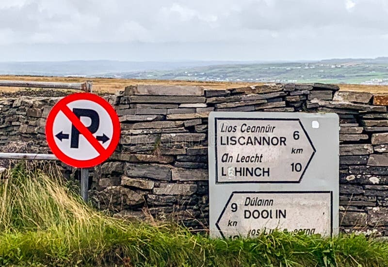Irish Road Signs County Clare Stock Photo - Image of white, cloudy ...