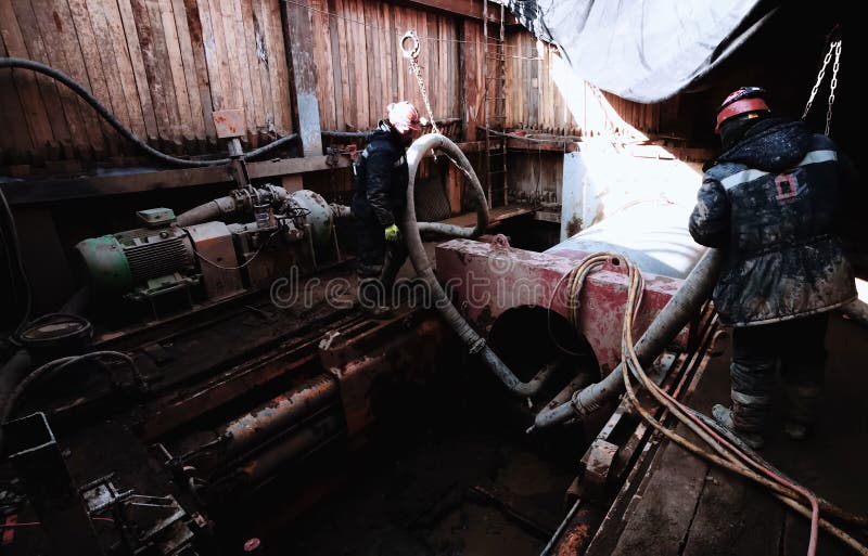 Workers Work on Pipeline Operations. Pipe Penetration Editorial Photo ...